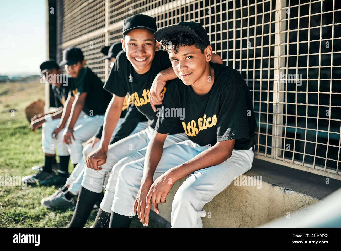 My best friend loves baseball too. Shot of a group of baseball players ...