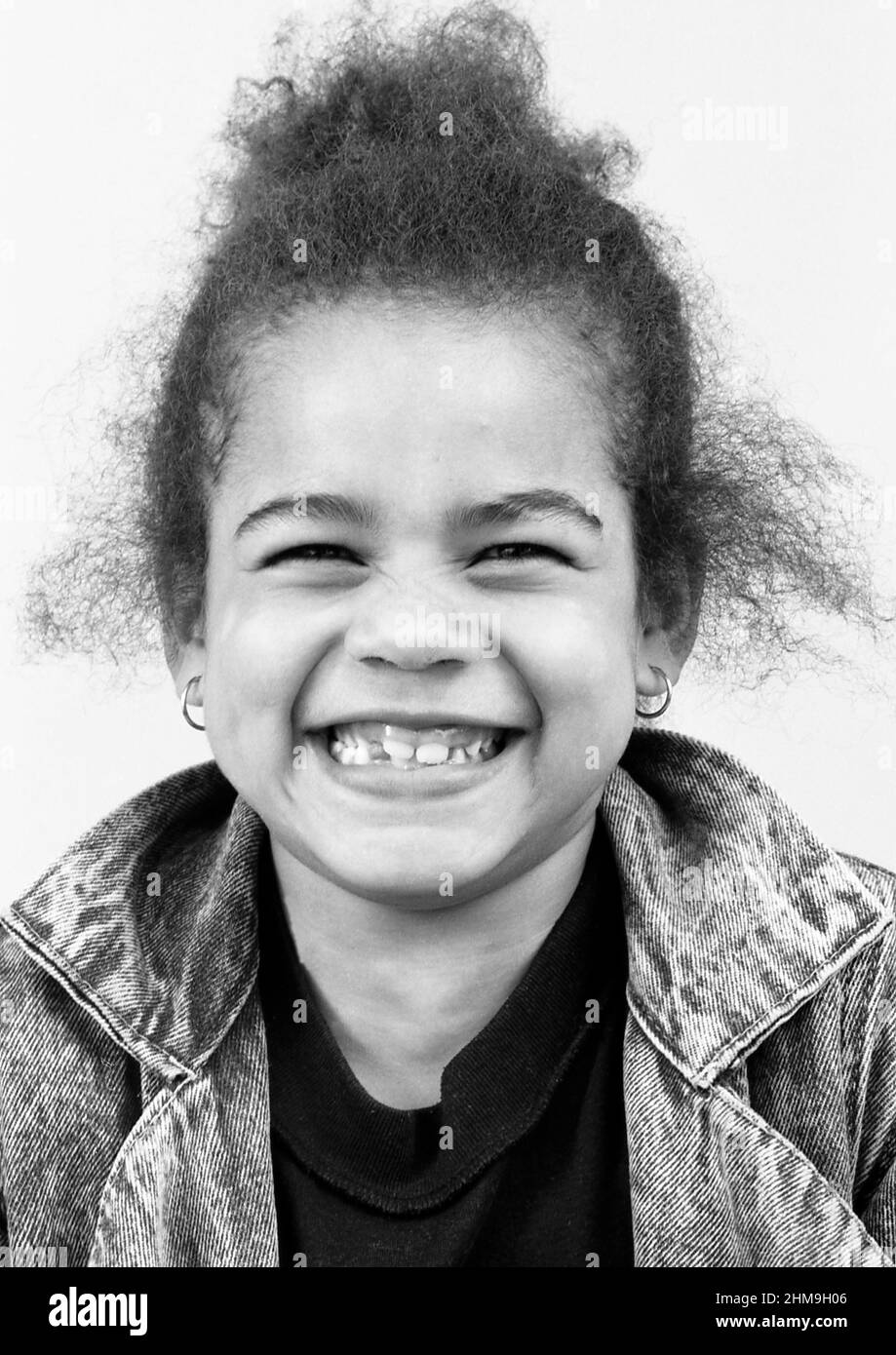 Studio portrait of small girl, UK MR Stock Photo - Alamy