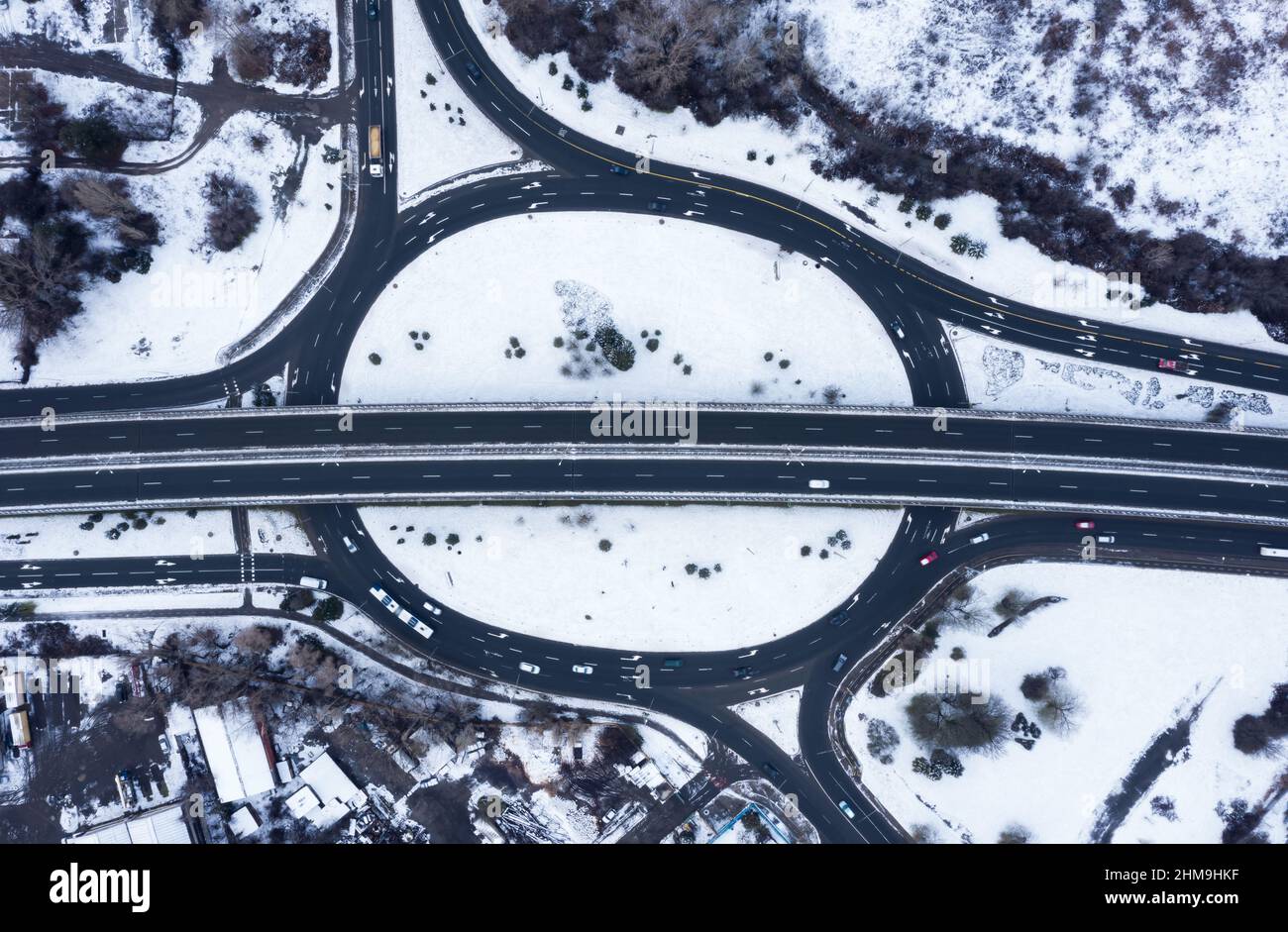 Aerial view of cars driving in a roundabout Stock Photo - Alamy