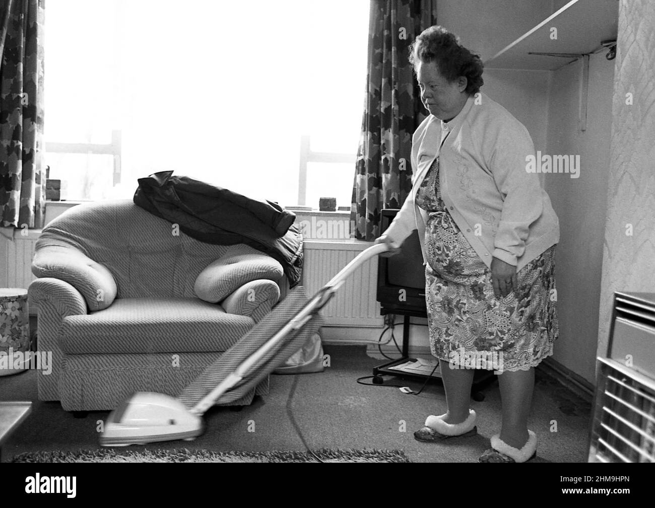 Hoovering woman hi-res stock photography and images - Alamy