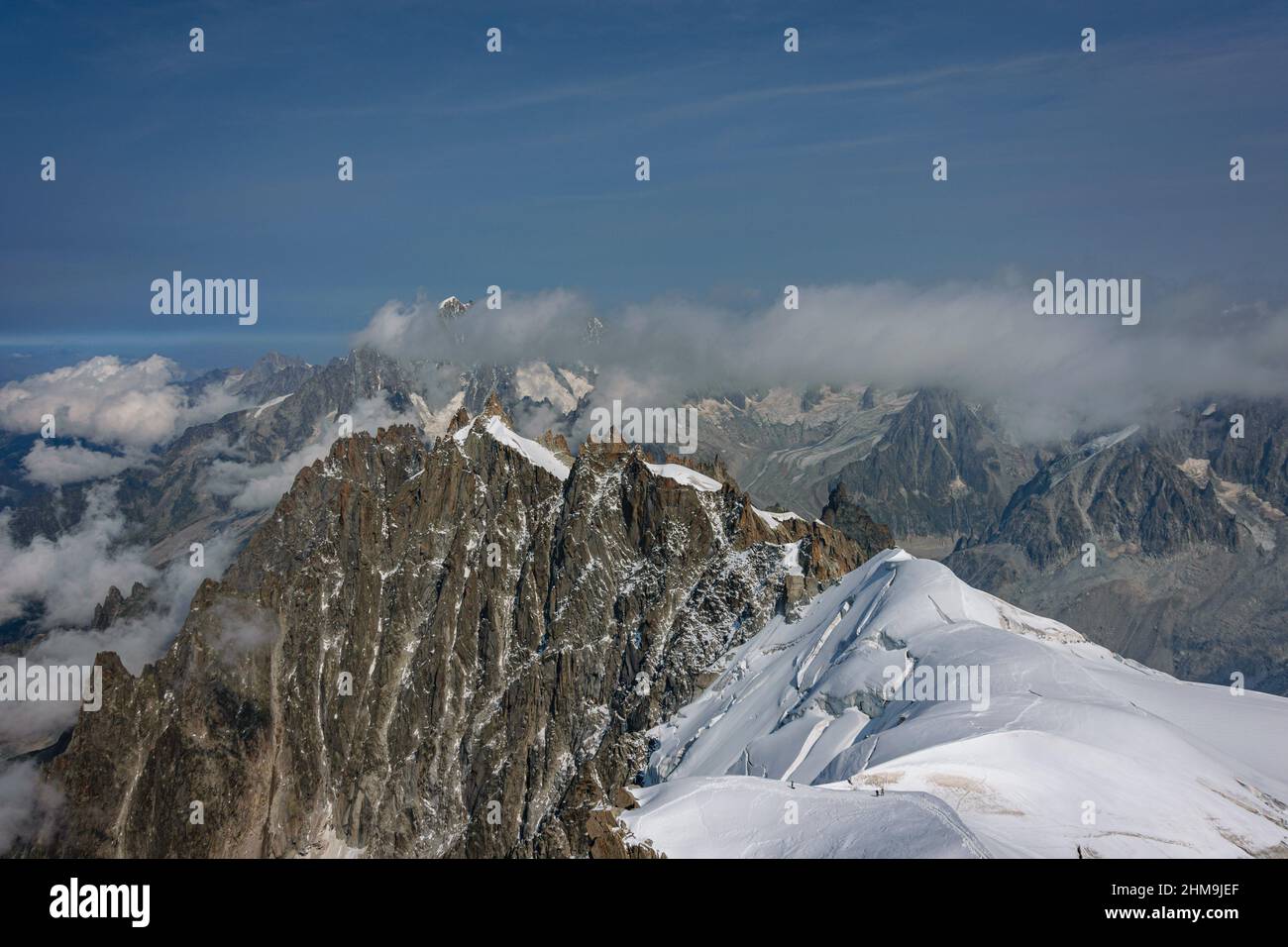 Alpine views from Aiguille du Midi viewing platform above Chamonix underneath Mont Blanc Stock ...