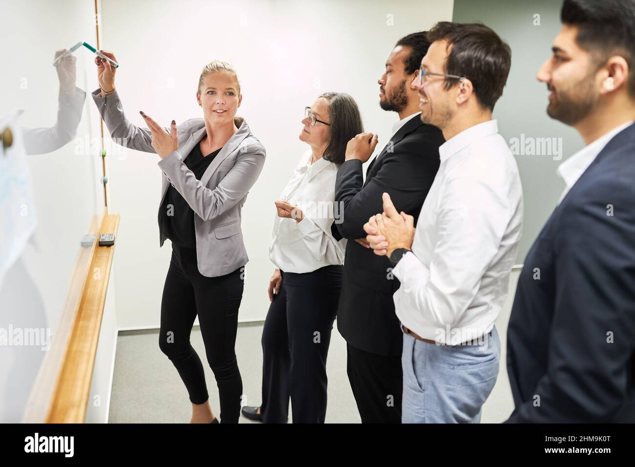 Colleagues business presentation team planning hi-res stock photography ...