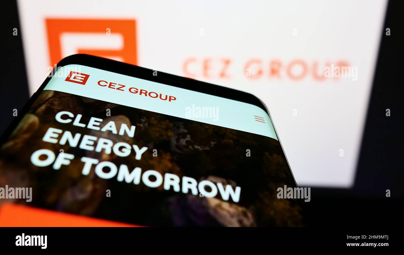 Mobile phone with website of Czech energy company CEZ a.s. on screen in ...
