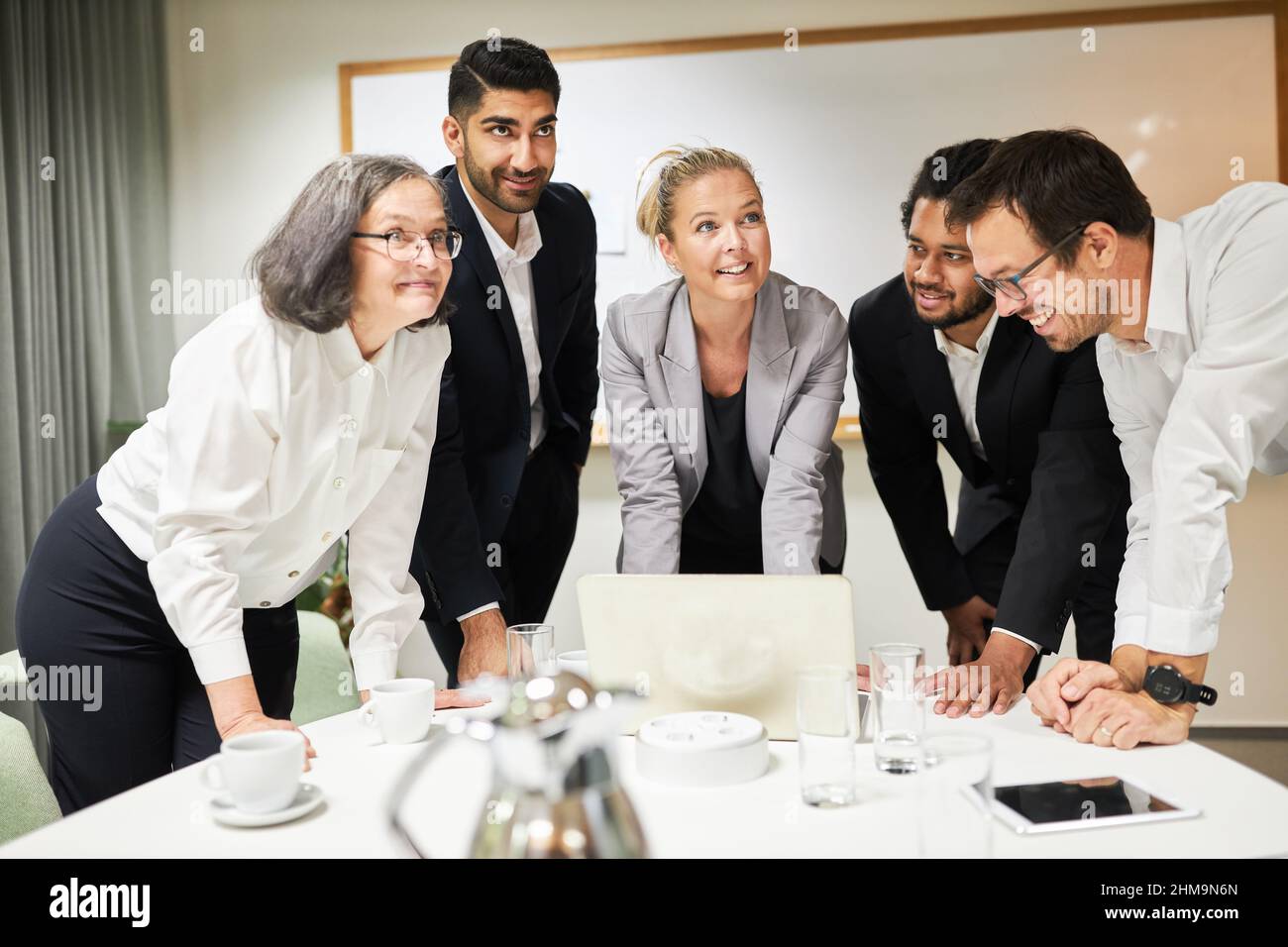Group of young business start up people together in computer computing workshop in conference ...