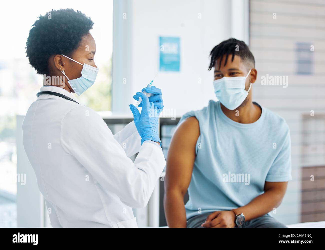 Doctor big needle hi-res stock photography and images - Alamy