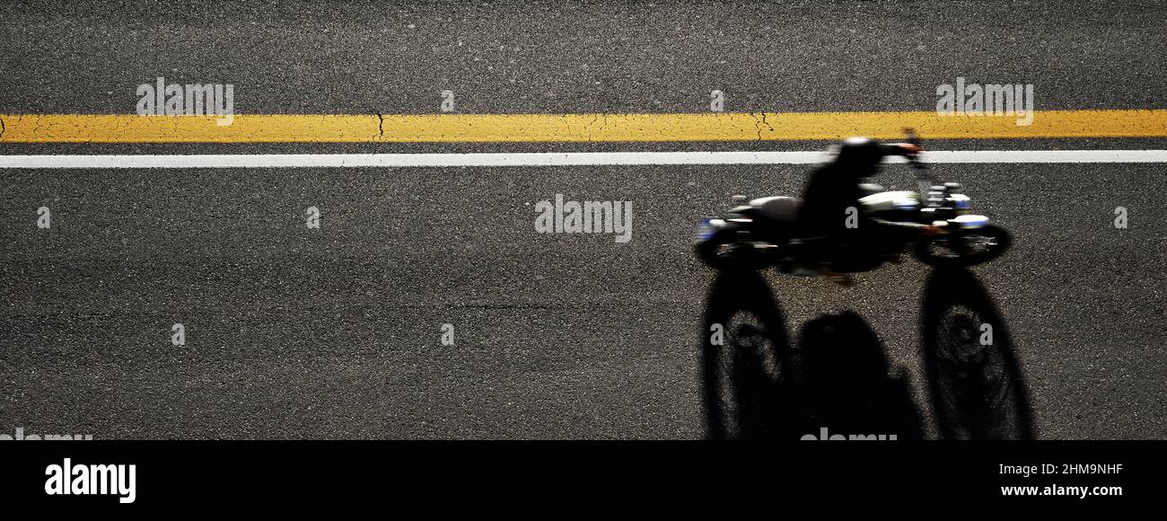 Horizontal banner with top view of the Biker driving his motorcycle on ...