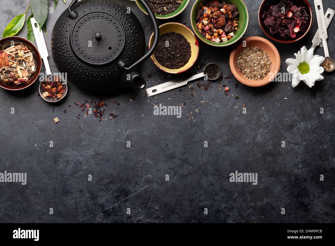 Various dried tea and teapot. Top view flat lay with copy space Stock ...