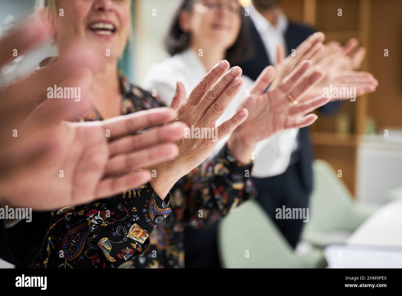 Group of business people clapping and giving applause with hands in ...