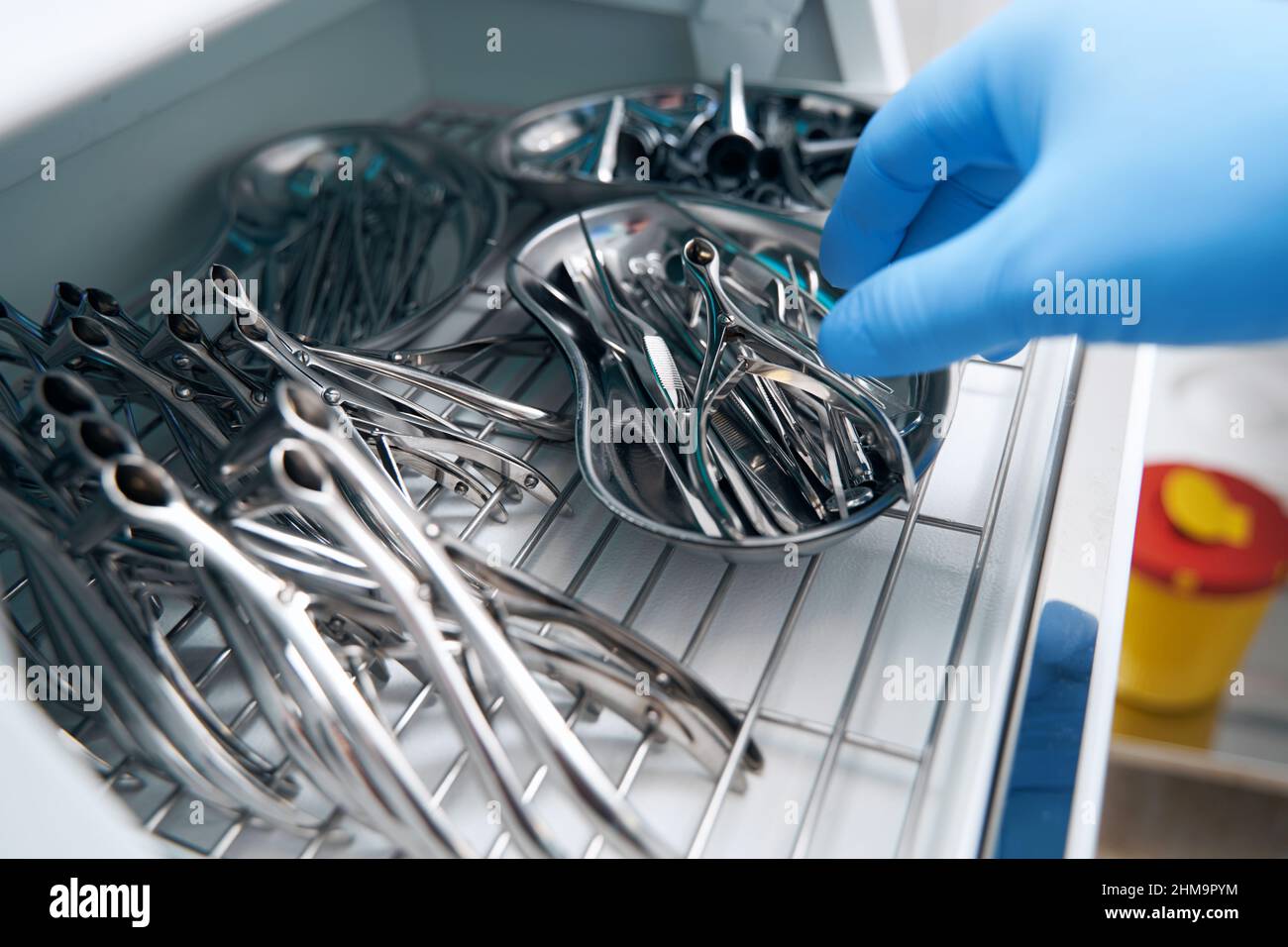 Photo of doctor hand in glove taking medical instruments Stock Photo ...