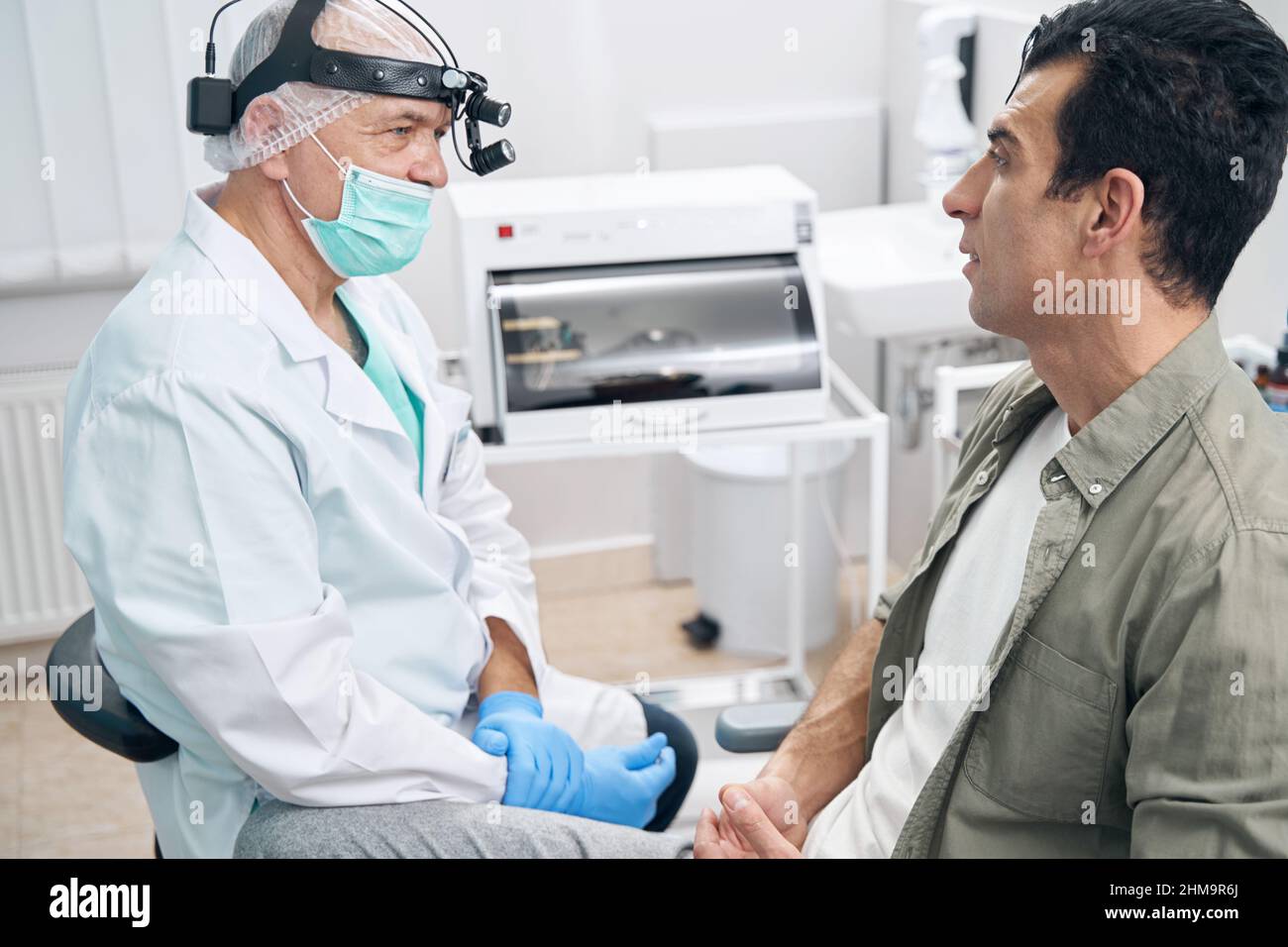 Portrait of doctor at work at the hospital Stock Photo - Alamy