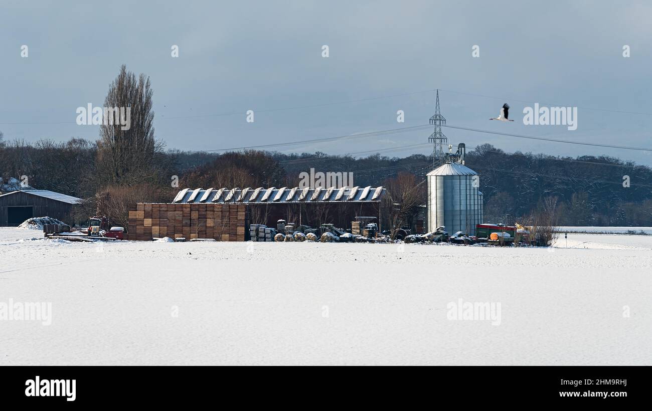 Snow-covered winter landscape with an industrial factory Stock Photo ...