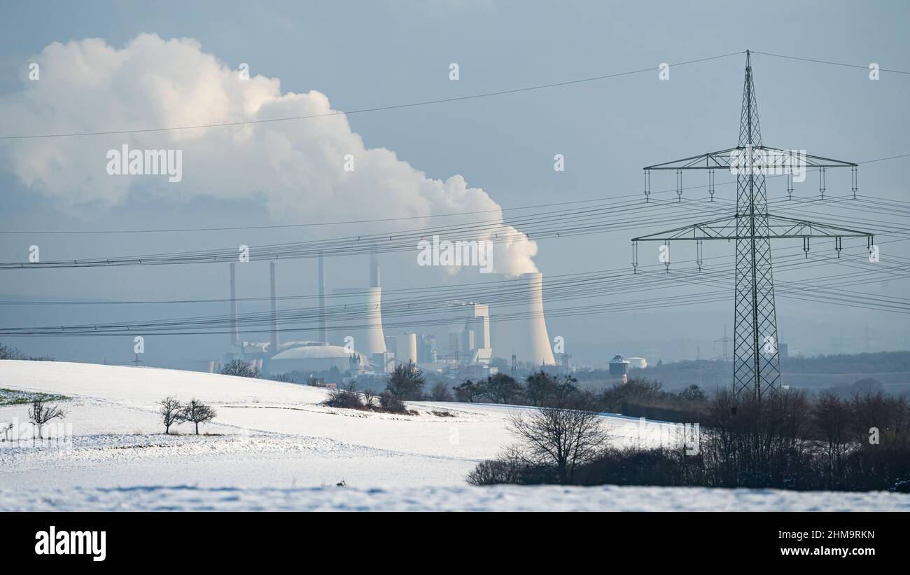 Snow-covered winter landscape with an industrial factory Stock Photo ...