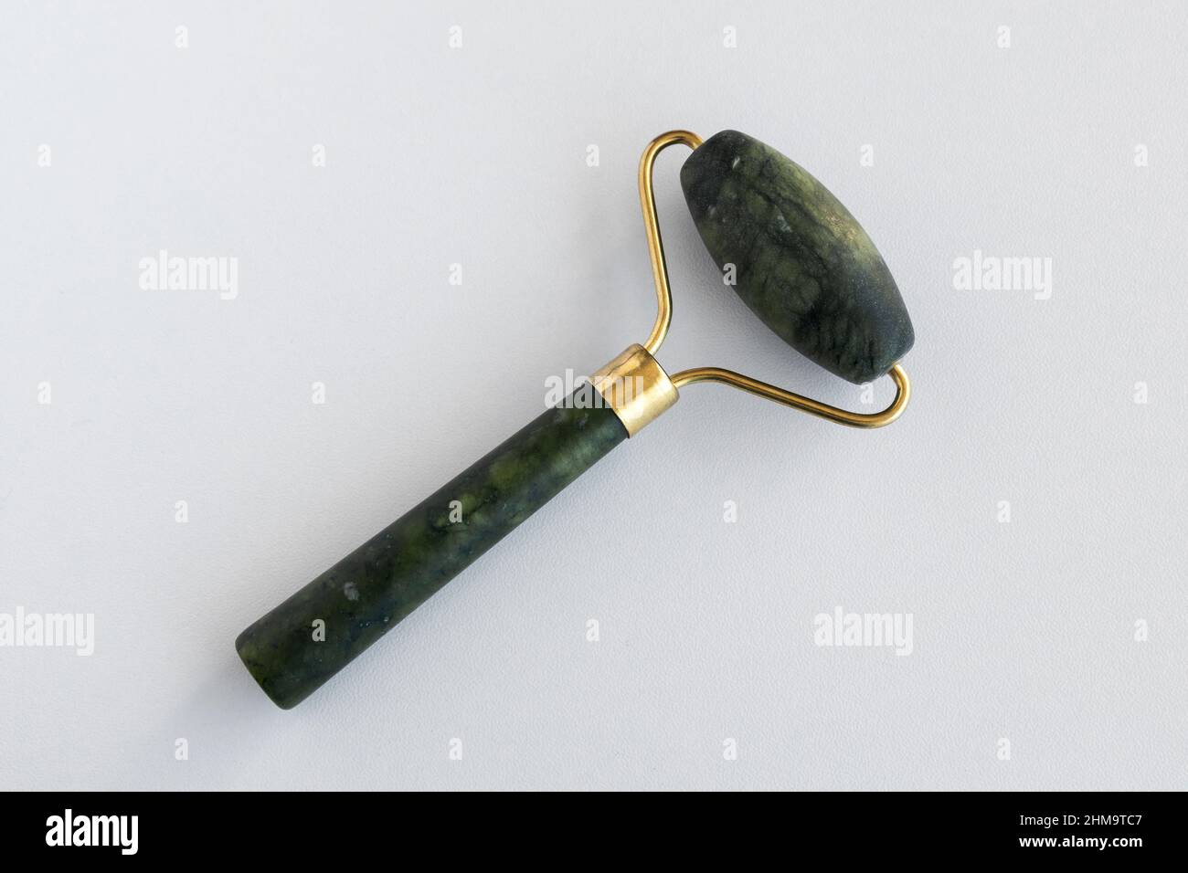 Beauty care jade roller Stock Photo - Alamy