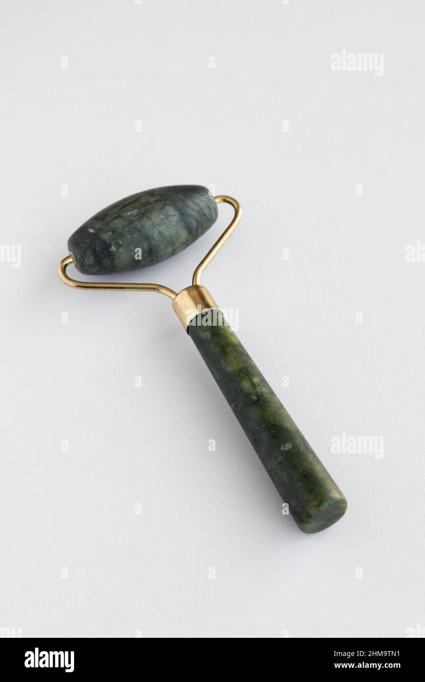 Beauty care jade roller Stock Photo - Alamy