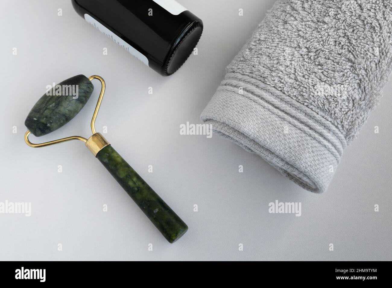 Beauty care jade roller Stock Photo - Alamy