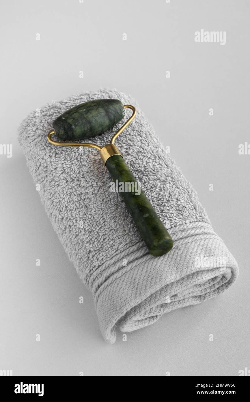 Beauty care jade roller Stock Photo - Alamy
