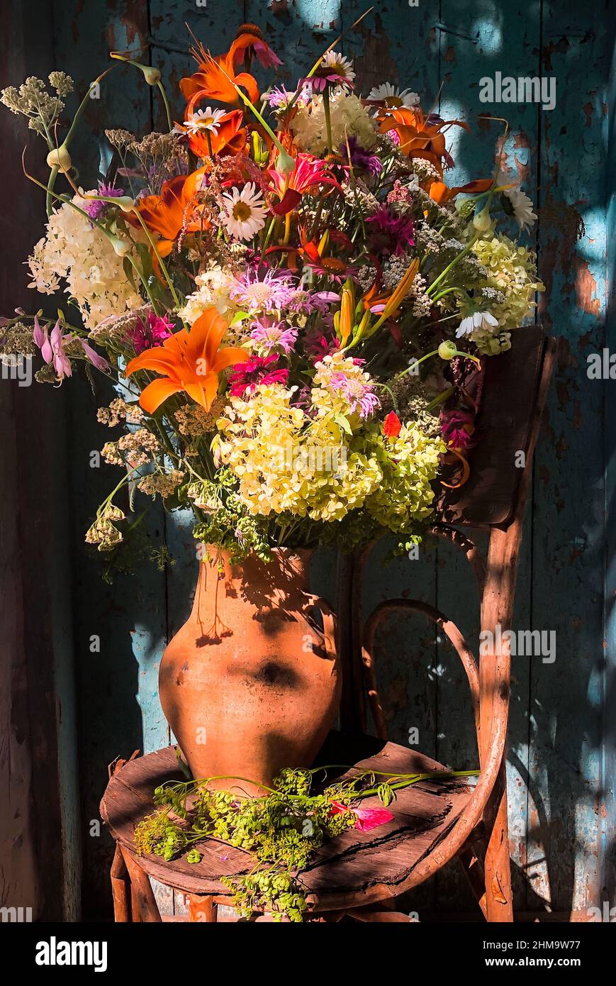 Romantic bouquet with daylilies, echinocea, monarda, hydrangea, yarrow ...