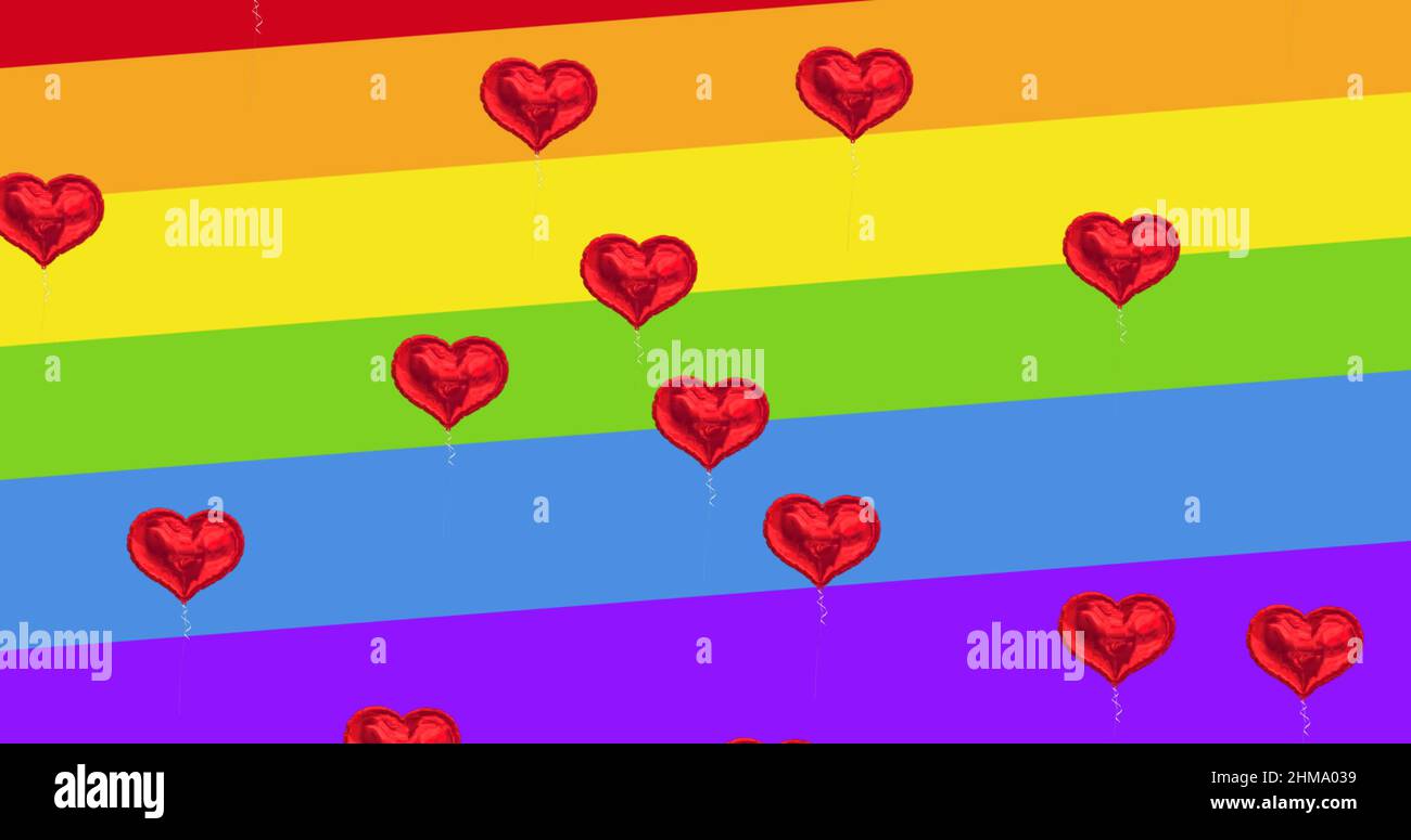 Image of hearts floating on rainbow background Stock Photo - Alamy