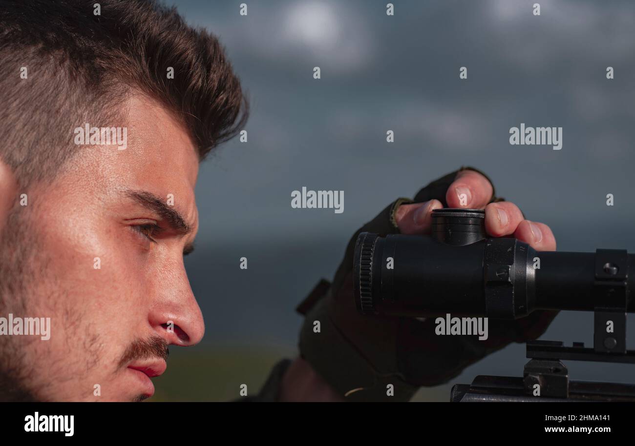 Close up snipers carbine at the outdoor hunting. Close-up Target with ...