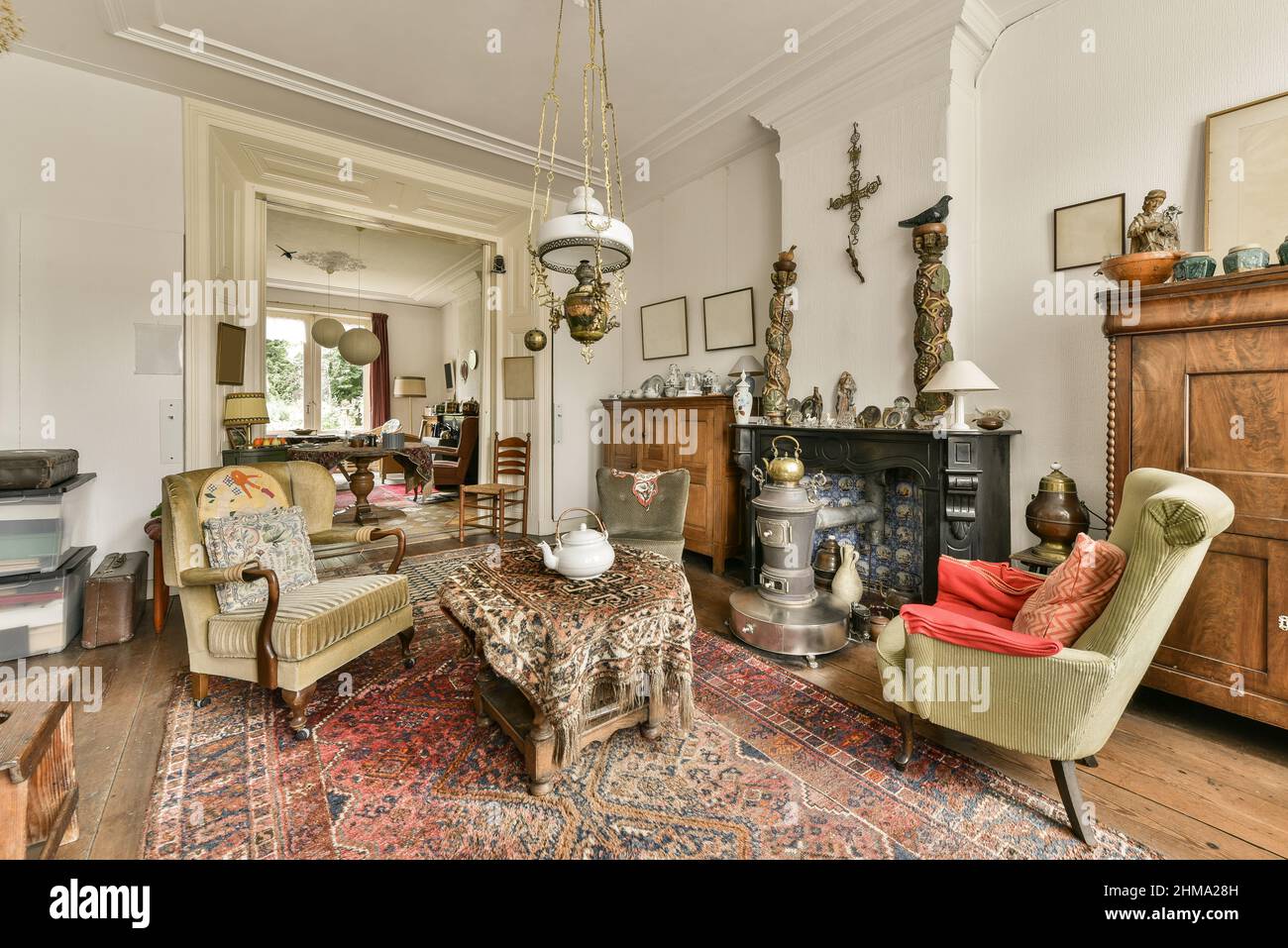 Interior of spacious lounge zone with old fashioned furniture designed ...