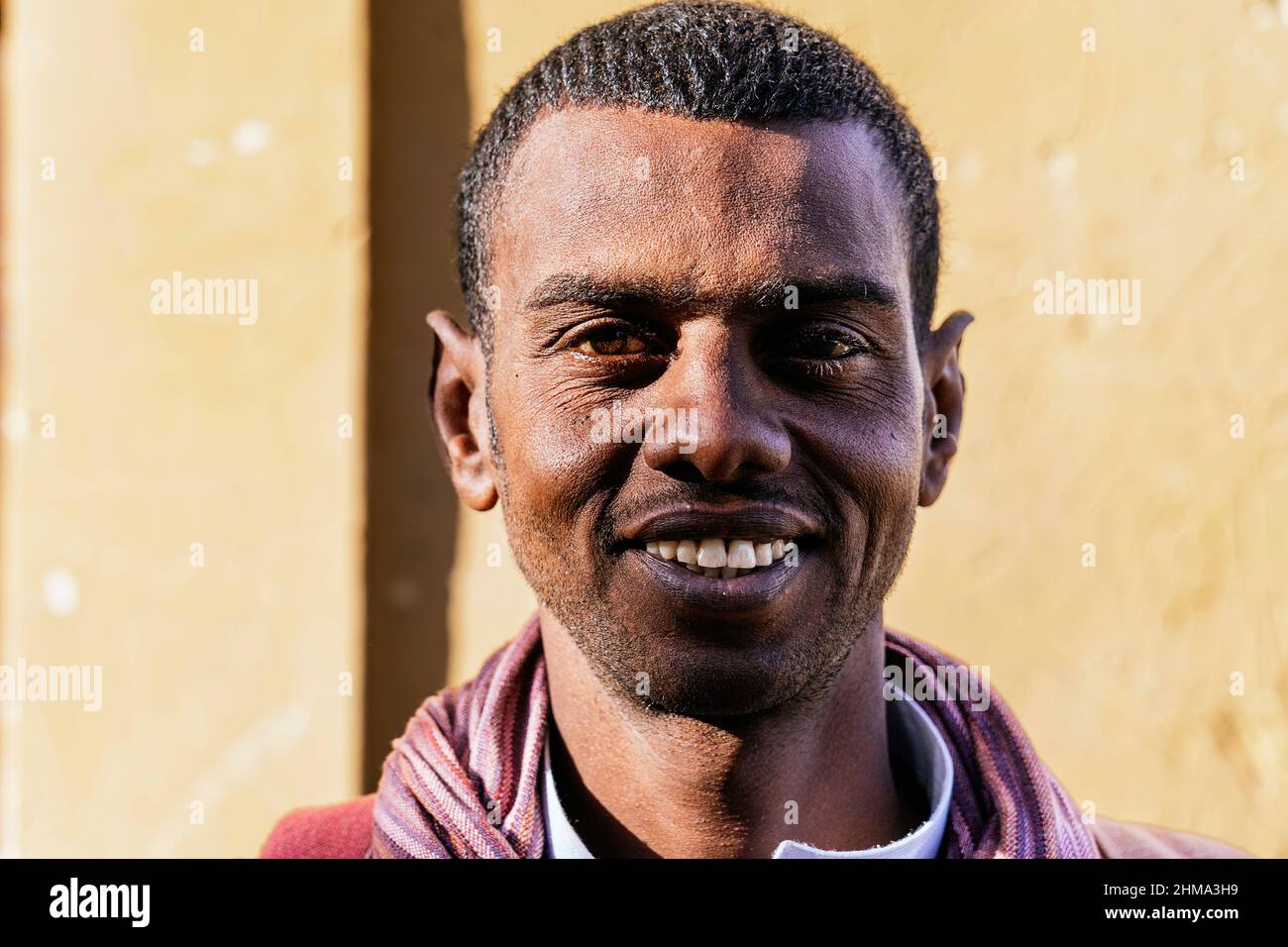 Brown eyes male smile hi-res stock photography and images - Alamy