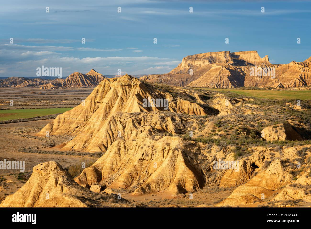 Majestic view of rough mountainous cliffs located in bad land terrain ...