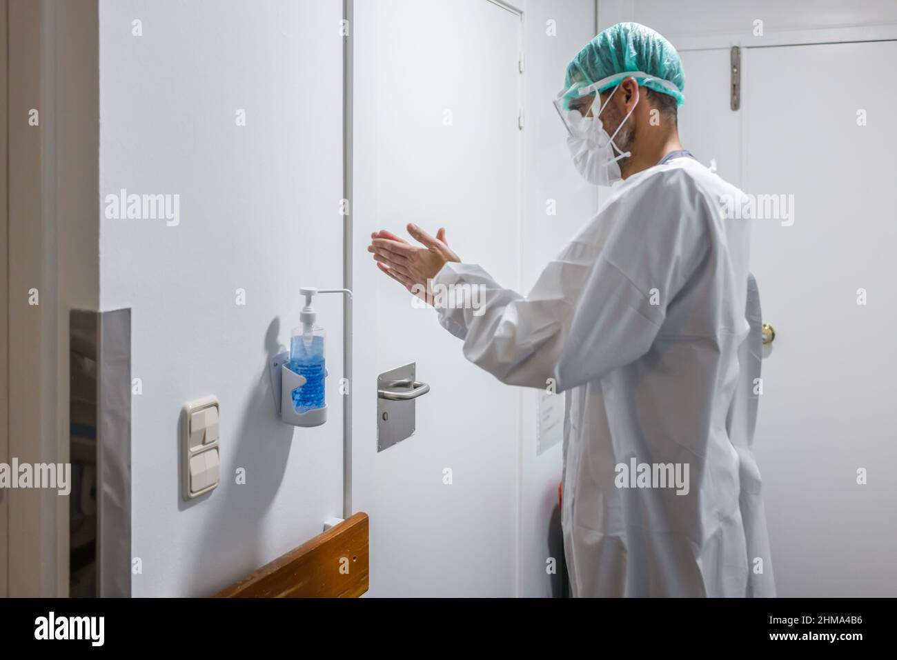 Visitor entering hospital hi-res stock photography and images - Alamy