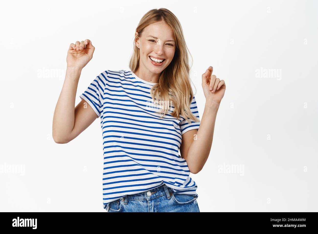 Dancing happy woman laughing and smiling, enjoying moment, posing ...