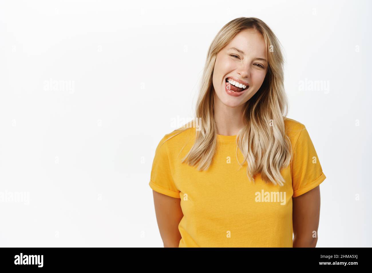Happy people. Beautiful girl smiling and showing white perfect teeth ...
