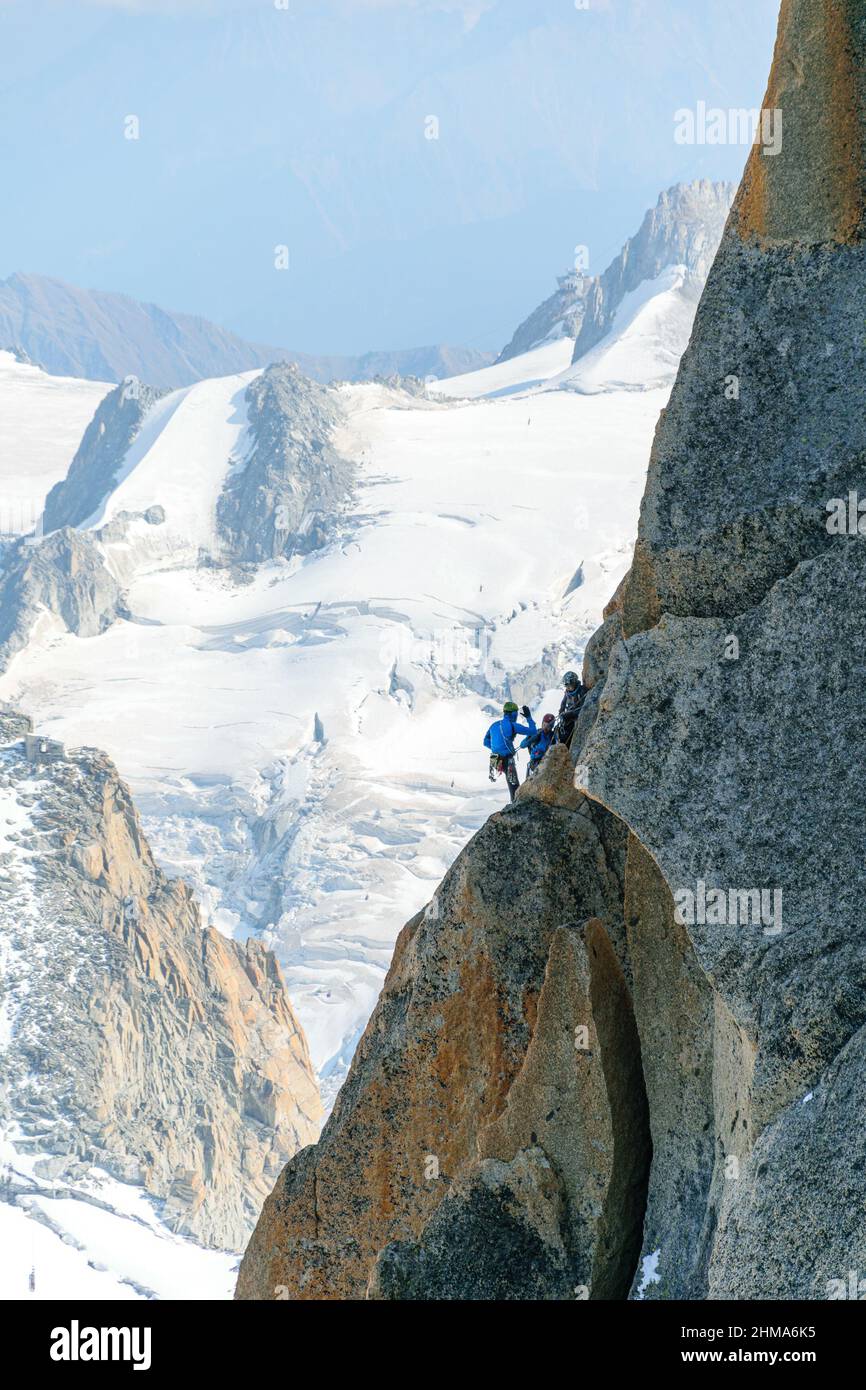 Rock climbers on the Aiguille du Midi viewing platform above Chamonix ...