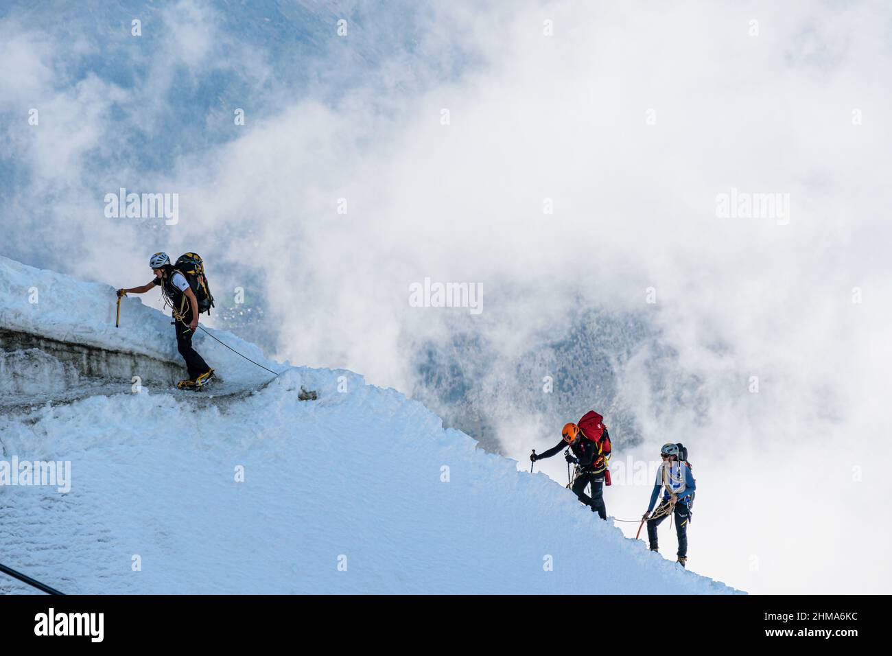 Climbing to the Aiguille du Midi viewing platform above Chamonix ...