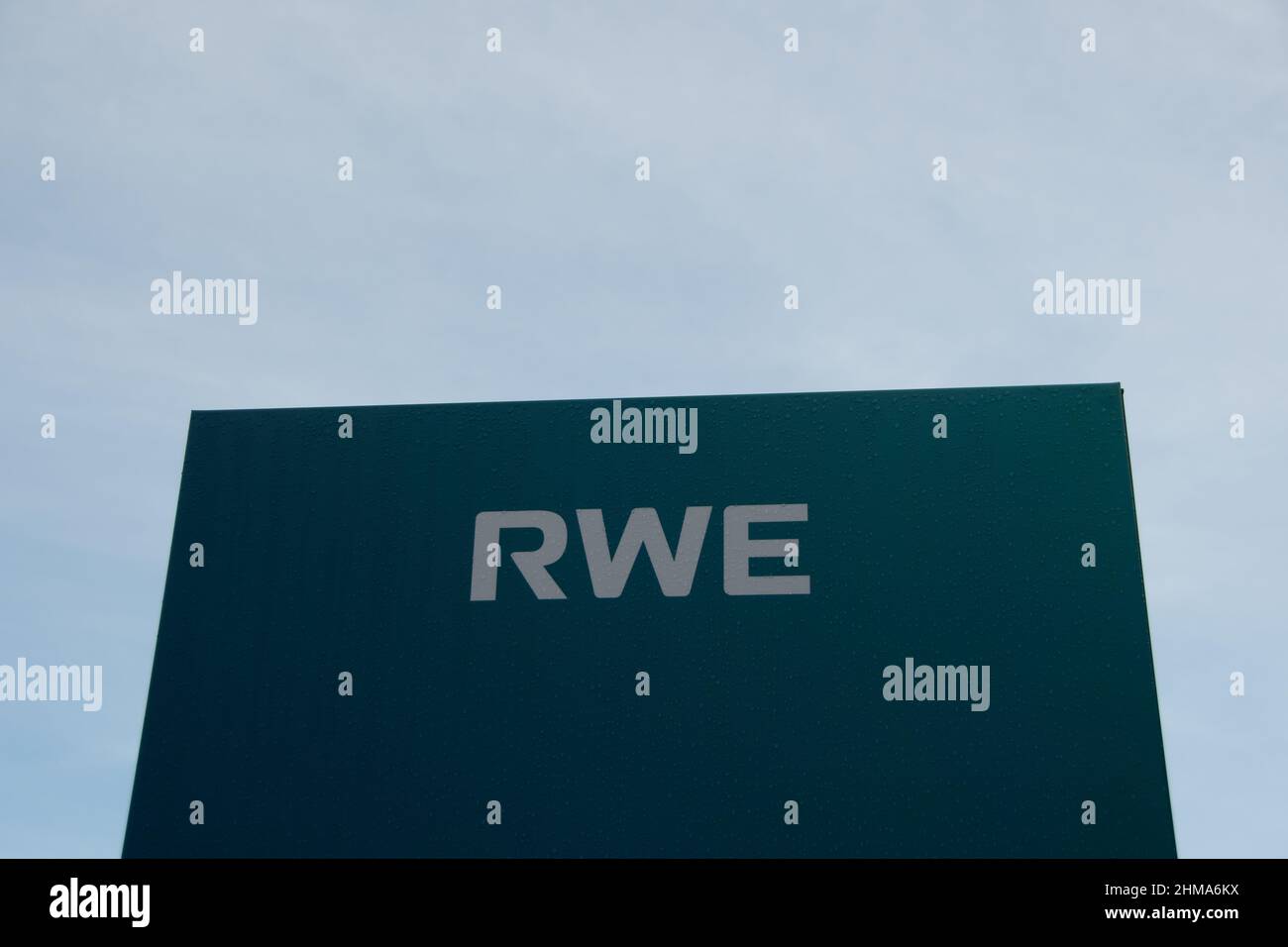 HEIMBACH, GERMANY 19 February 2021, A blue RWE sign with a blue sky in ...