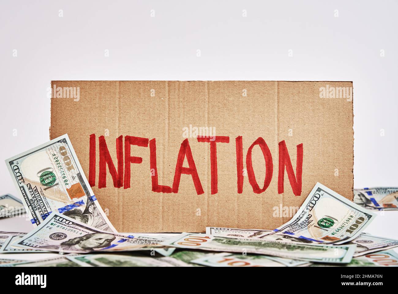 World Economic Crisis And Inflation Concept Cardboard Sheet With Word