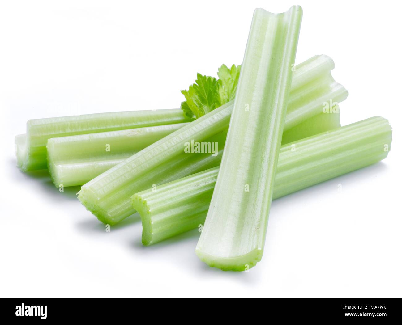 Pile of celery ribs isolated on white background Stock Photo - Alamy