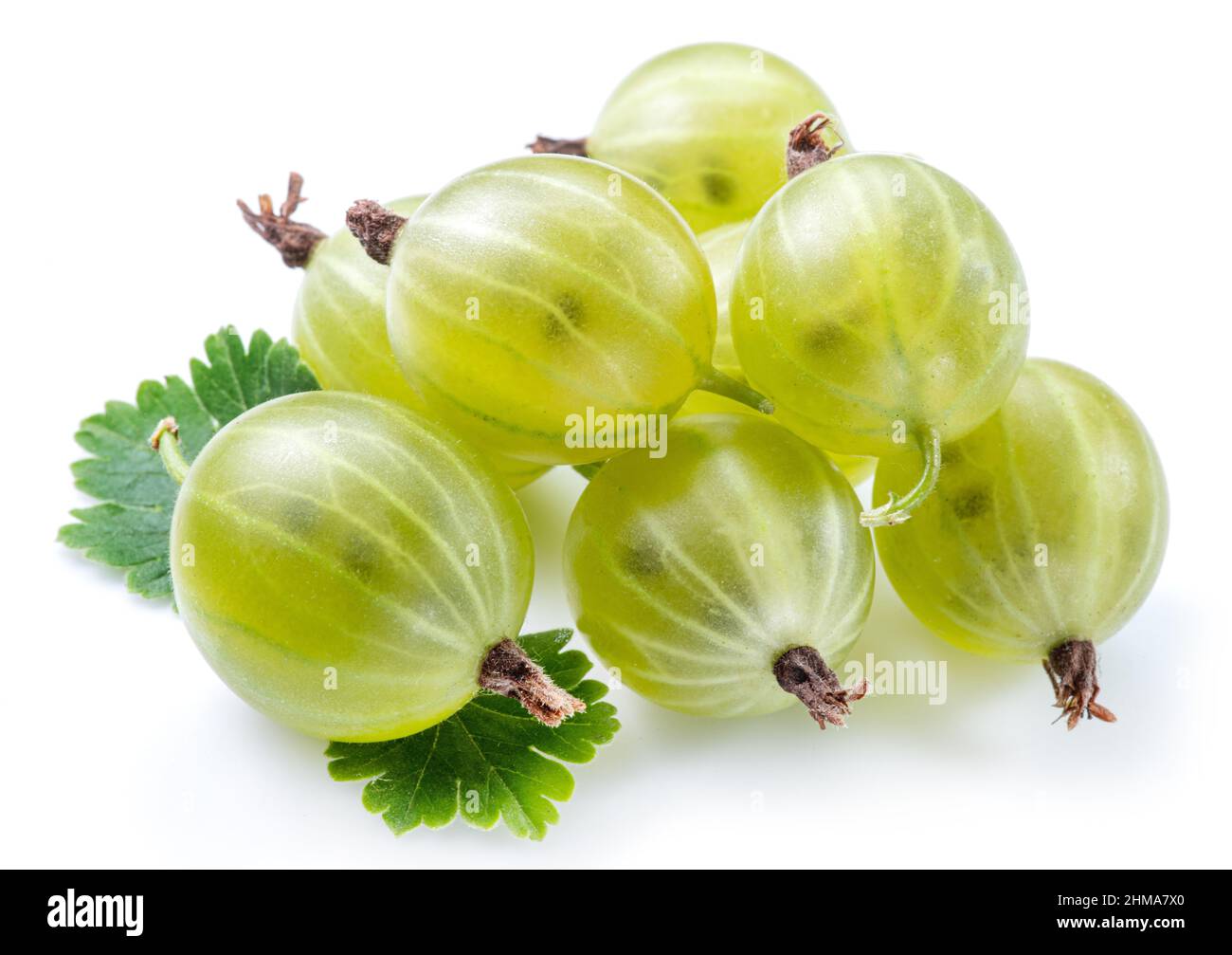 Green ripe gooseberries on white background. Close-up Stock Photo - Alamy