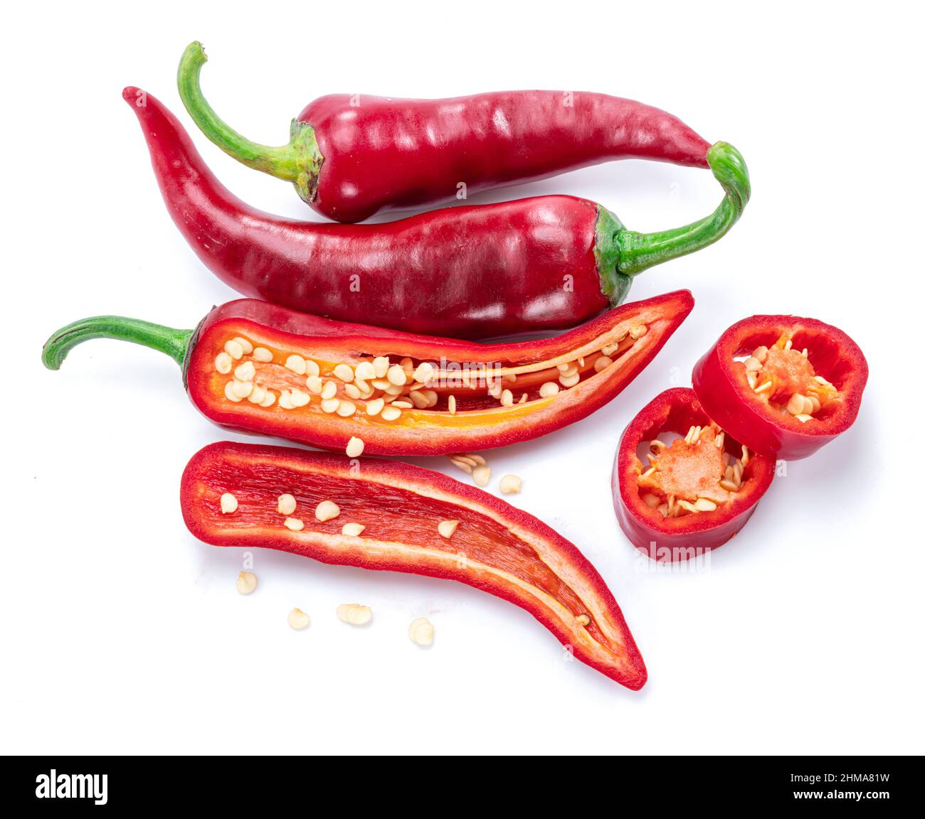 Fresh red chilli pepper and cross section of chilli peppers with seeds ...