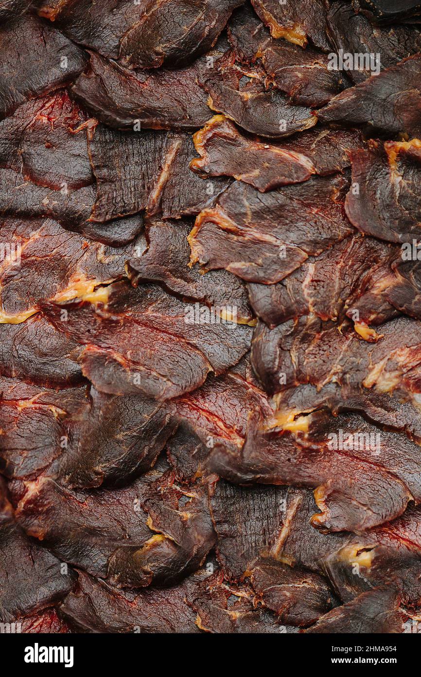 Smoked meat slices in a texture. Looking delicious Stock Photo - Alamy