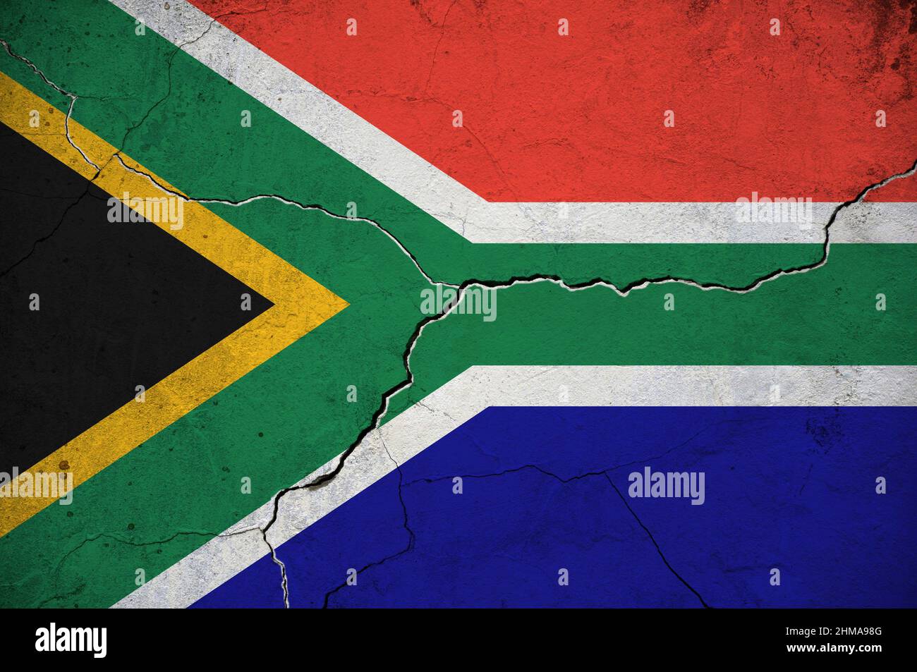 An image of the South African Republic flag on a wall with a crack ...