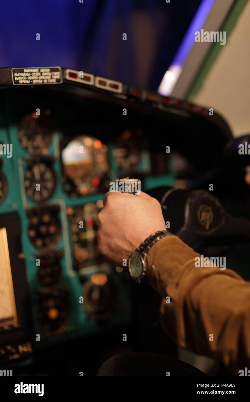 The hand of pilot on control column in the airliner Stock Photo - Alamy