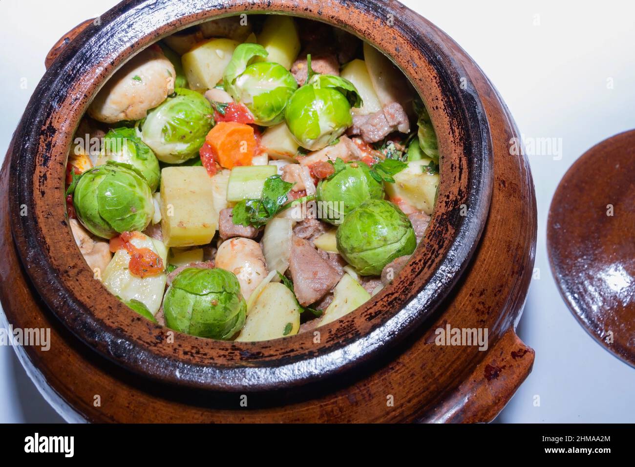 Traditional Balkan vegetable and meat stew in clay pot - ghivetch Stock ...