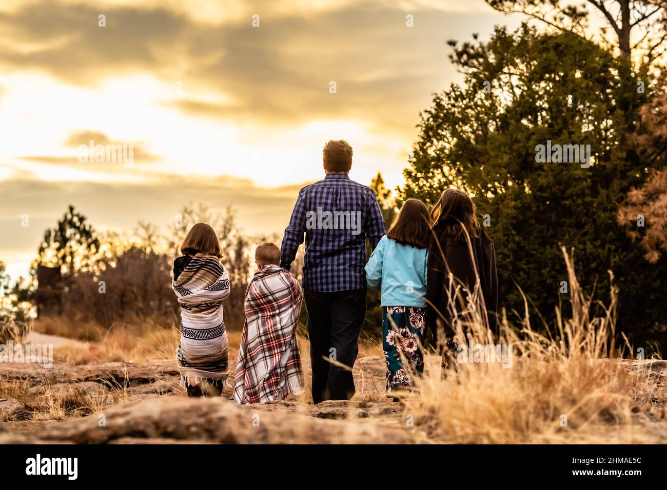 Father with Four children at Sunset Stock Photo - Alamy