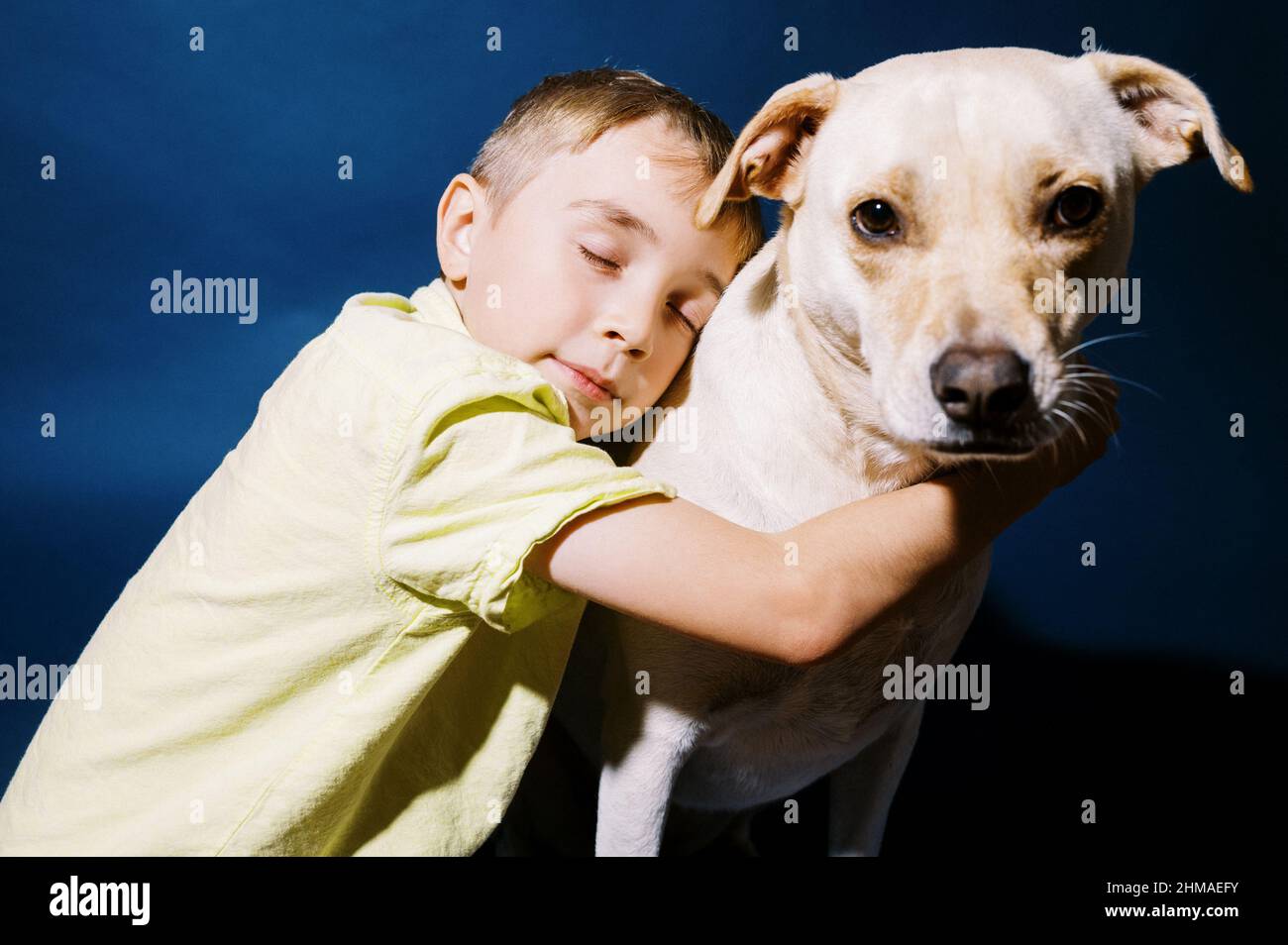 Boy hugging his dog hi-res stock photography and images - Alamy