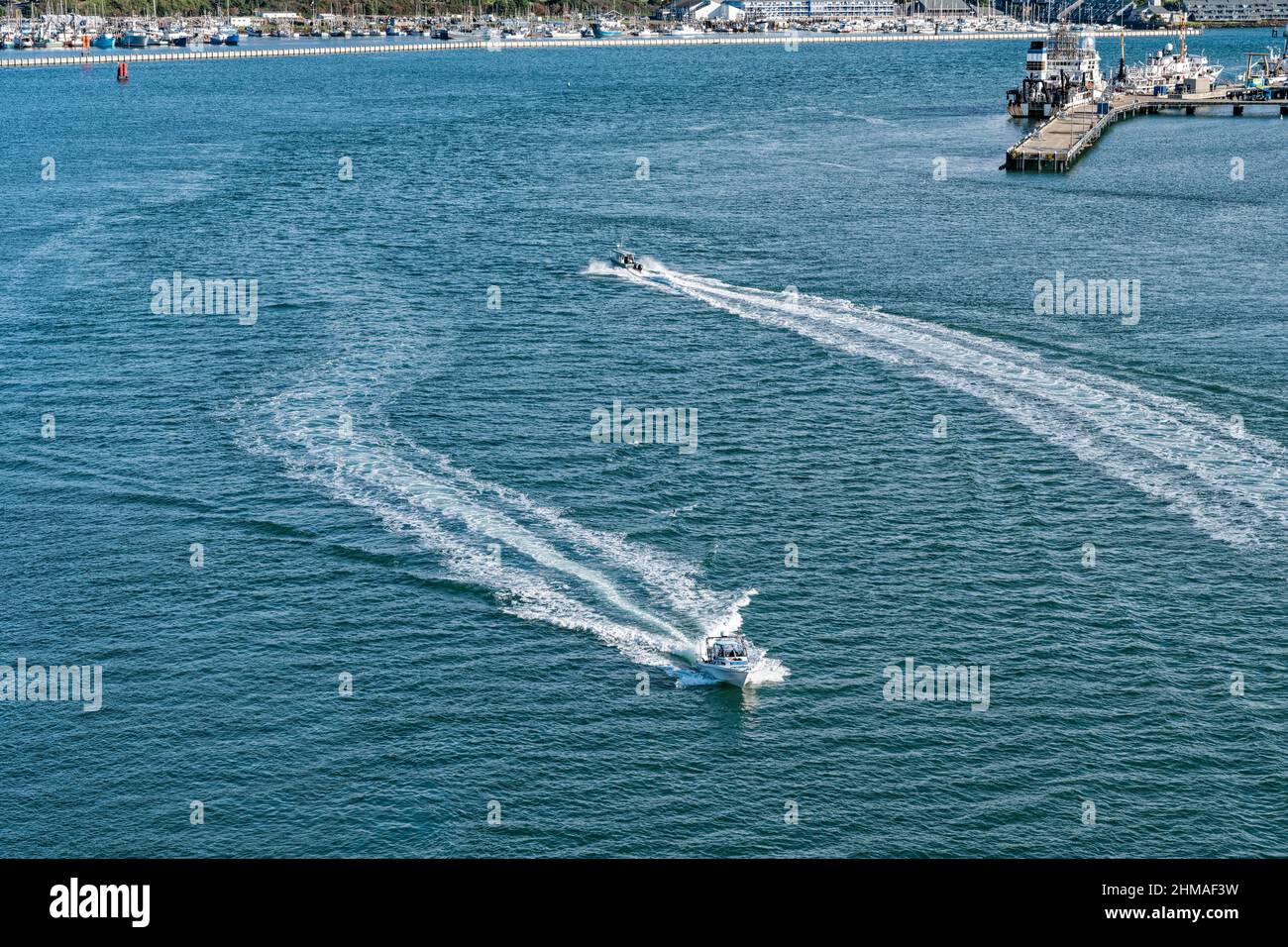 Two boats passing each other in Yaquina Bay at Newport, Oregon, USA ...