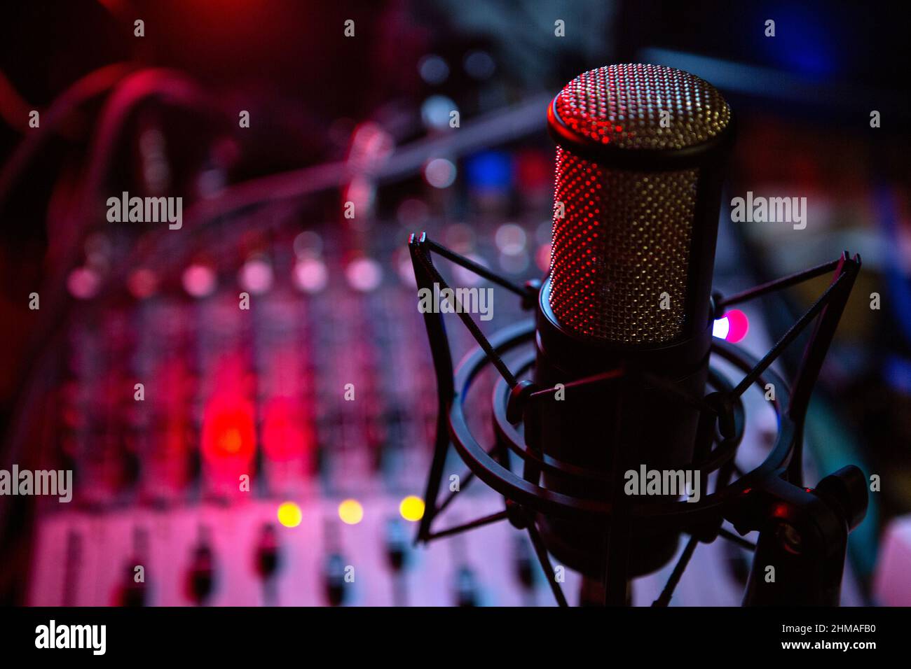 sound mixer and faders with condenser microphone DJ disco Stock Photo ...