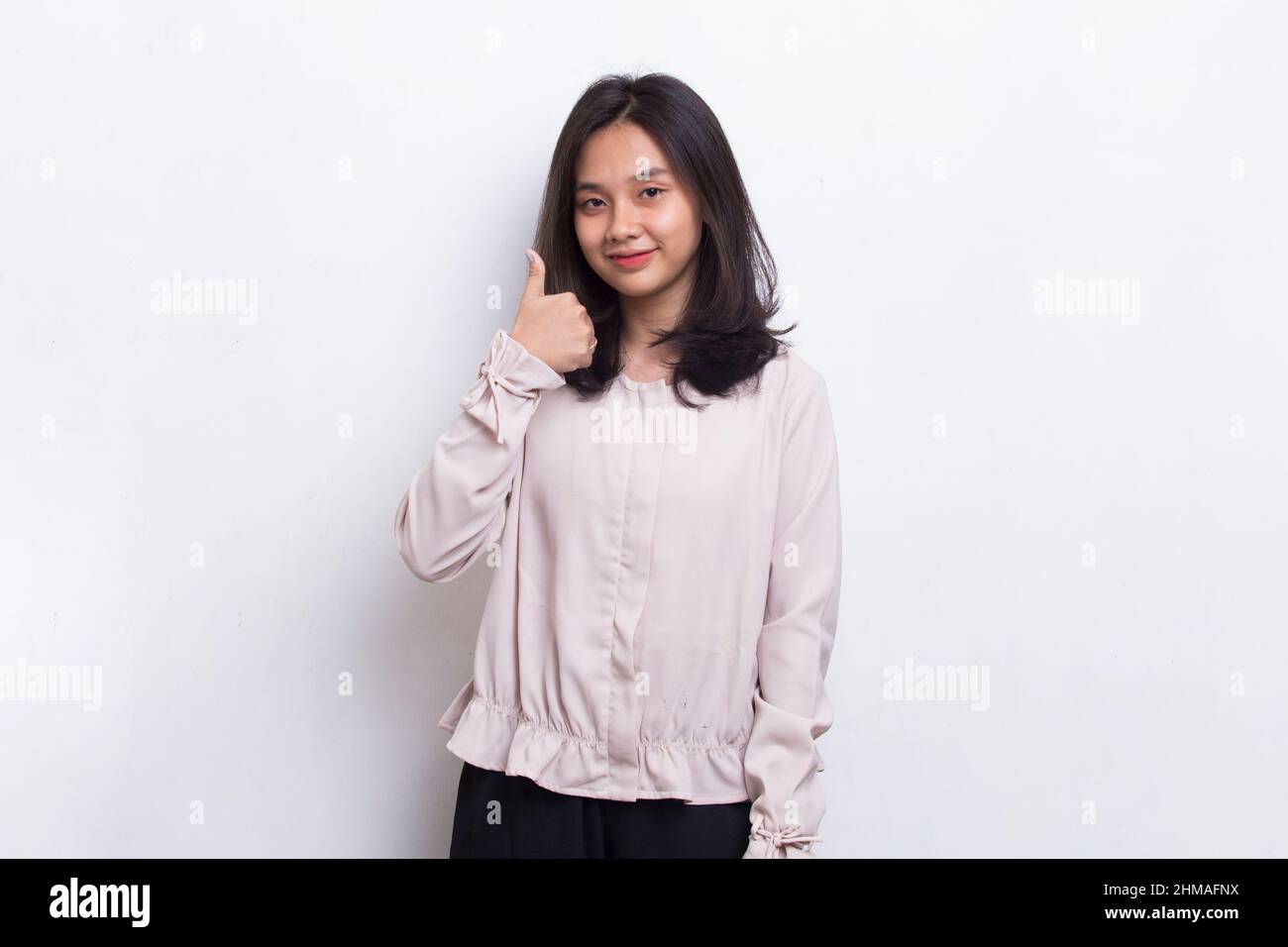 young asian beautiful woman with ok sign gesture tumb up isolated on white background Stock ...