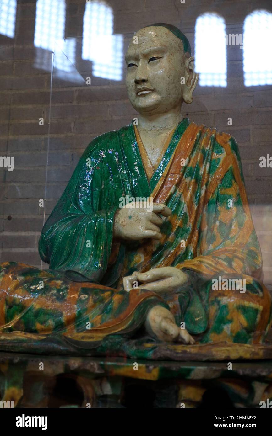 A glazed pottery statue of Luohan from China's Liao Dynasty display in ...