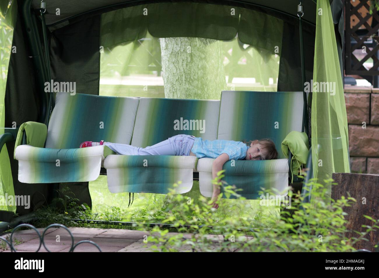 Teen resting on bedstone at summer, outdoor Stock Photo - Alamy