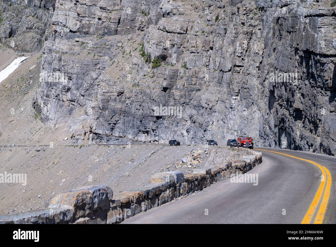 Montana, USA - July 1, 2021: A red jammer tour bus filled with tourists ...