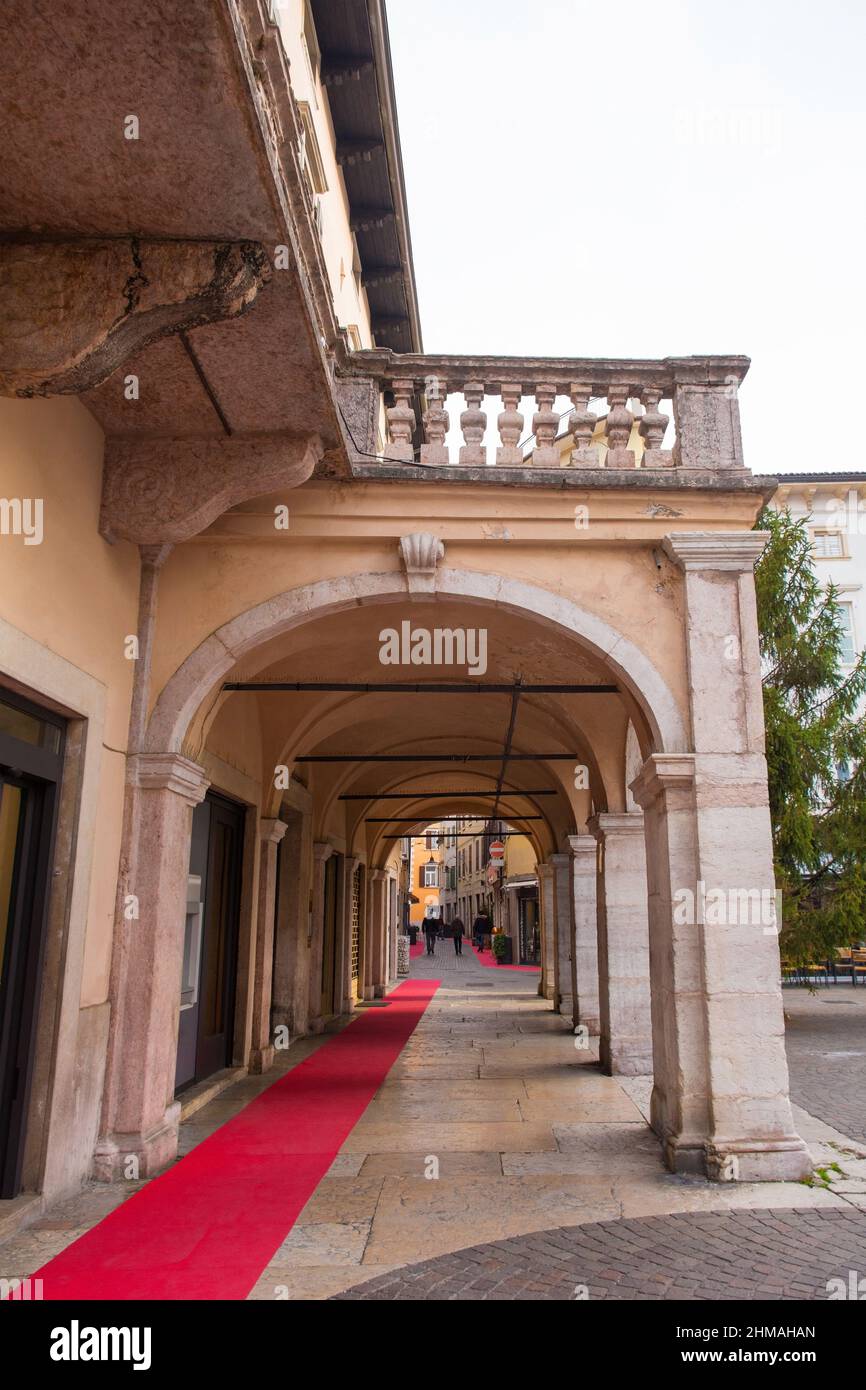 An historic covered portico in the small town of Arco on the North ...