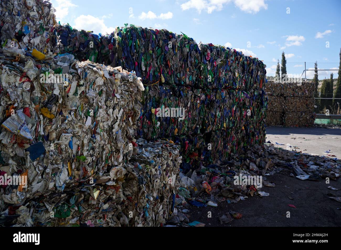 View of crushed garbage shaped in cubes for waste disposal Stock Photo ...